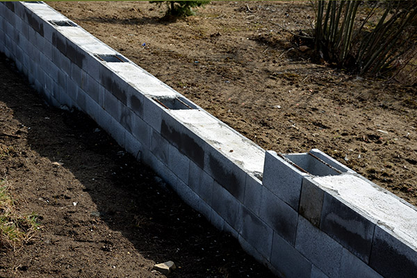 Poured Concrete Retaining Walls | Infinity Concrete Mixers Inc